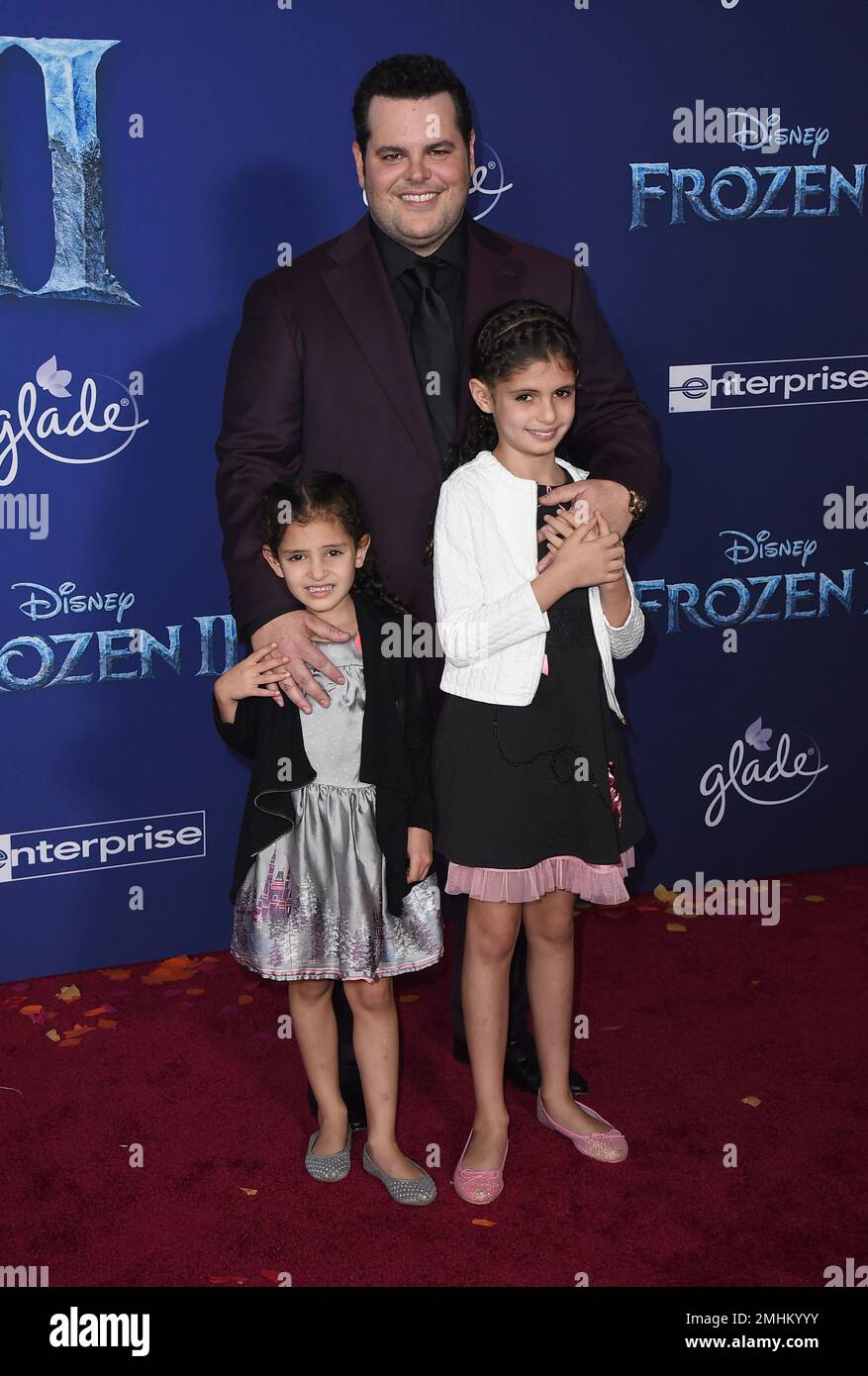 Josh Gad, center, poses with daughters Isabella Gad and Ava Gad at the ...