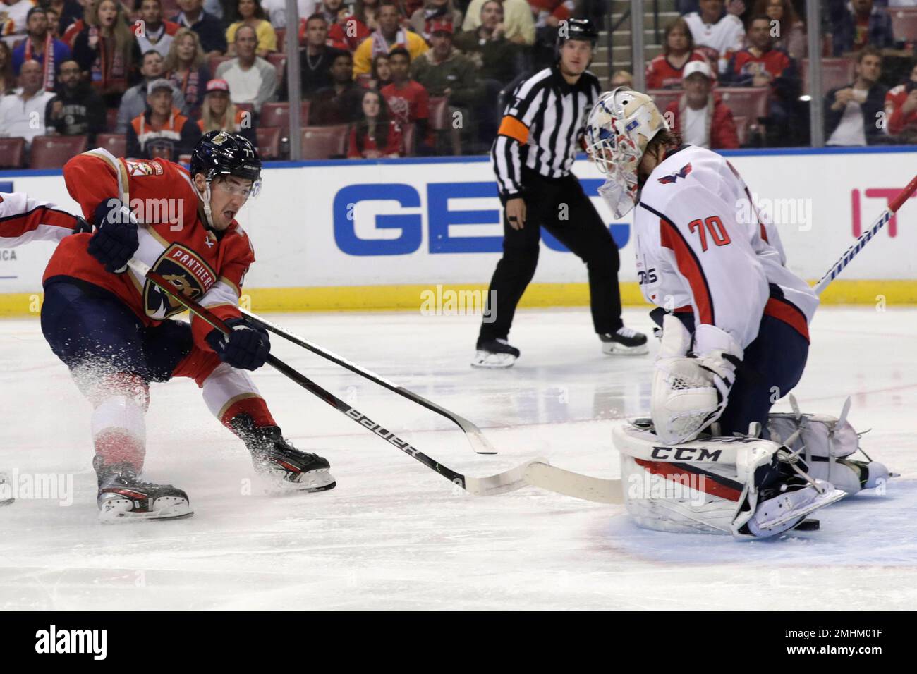 Florida Panthers center Frank Vatrano, left scores a goal past ...