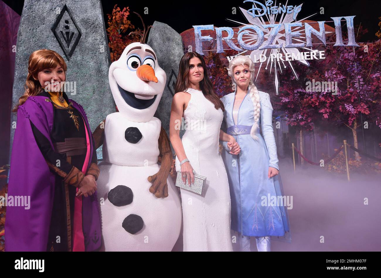 Idina Menzel, second right, poses with characters from "Frozen 2," from ...