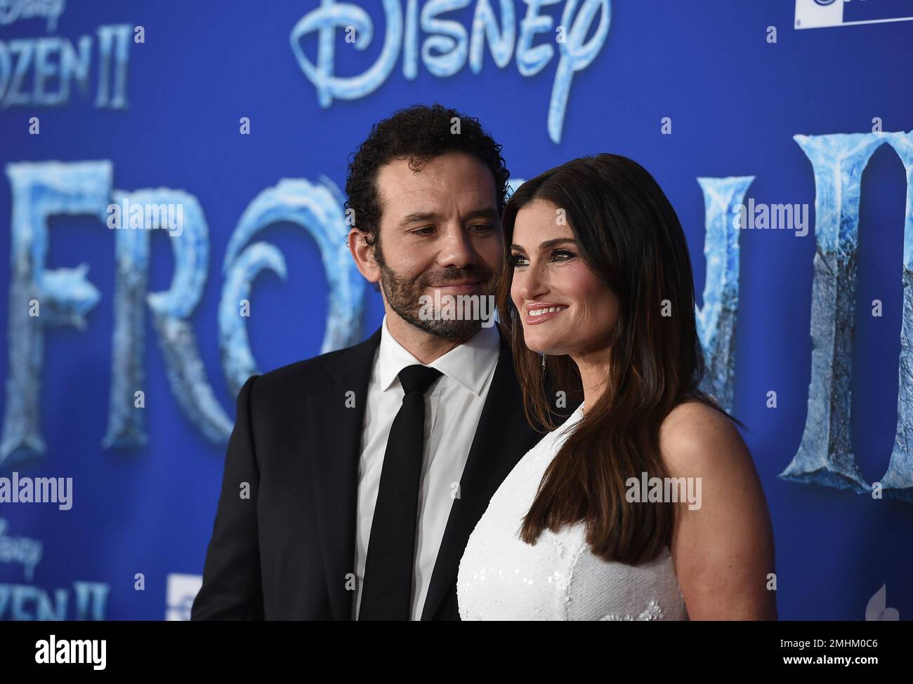Idina Menzel, right, and Aaron Lohr arrive at the world premiere of ...