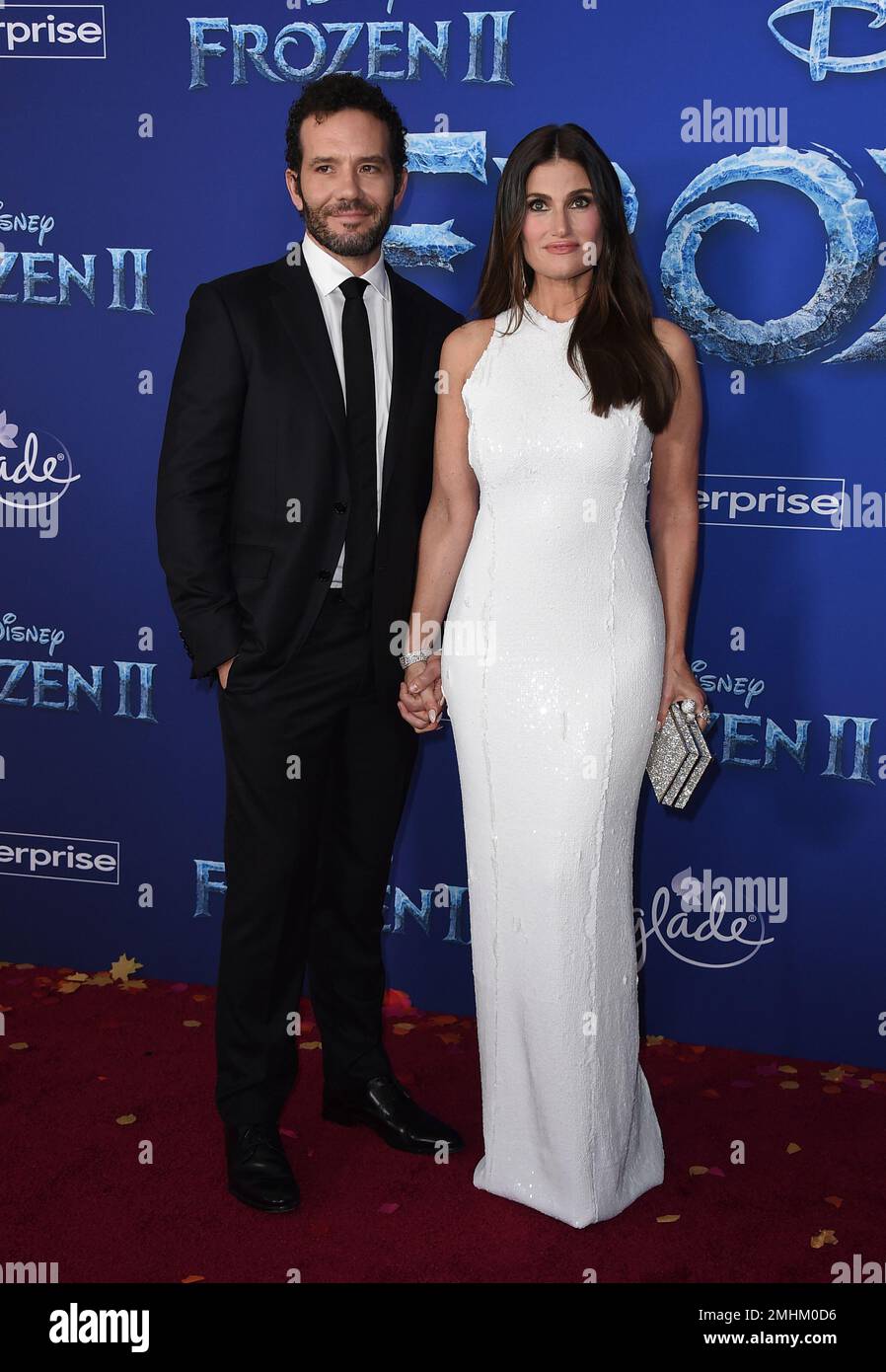 Idina Menzel, right, and Aaron Lohr arrive at the world premiere of ...