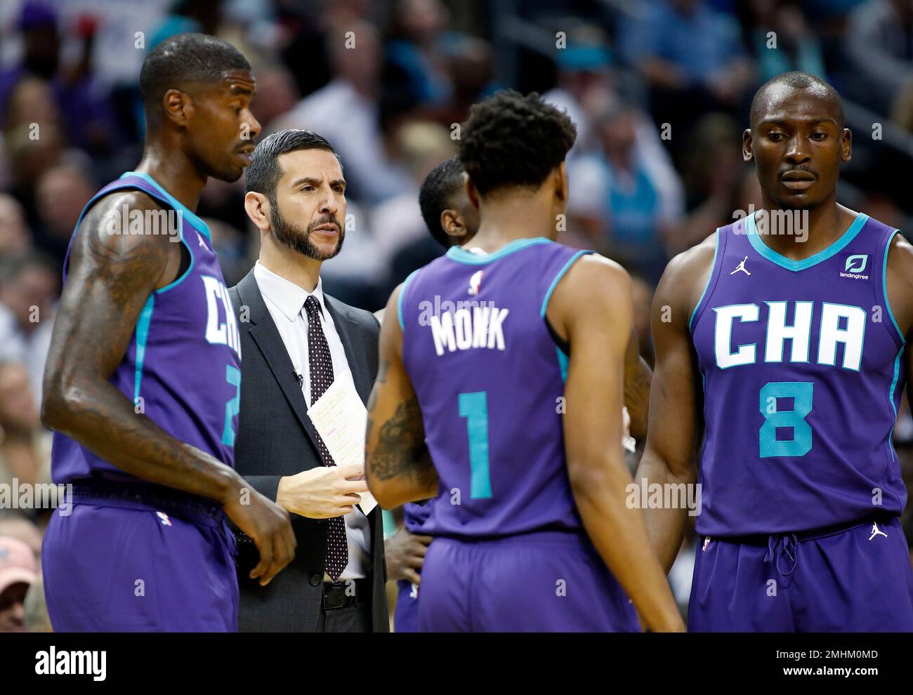 Charlotte Hornets coach James Borrego huddles with his team during a ...