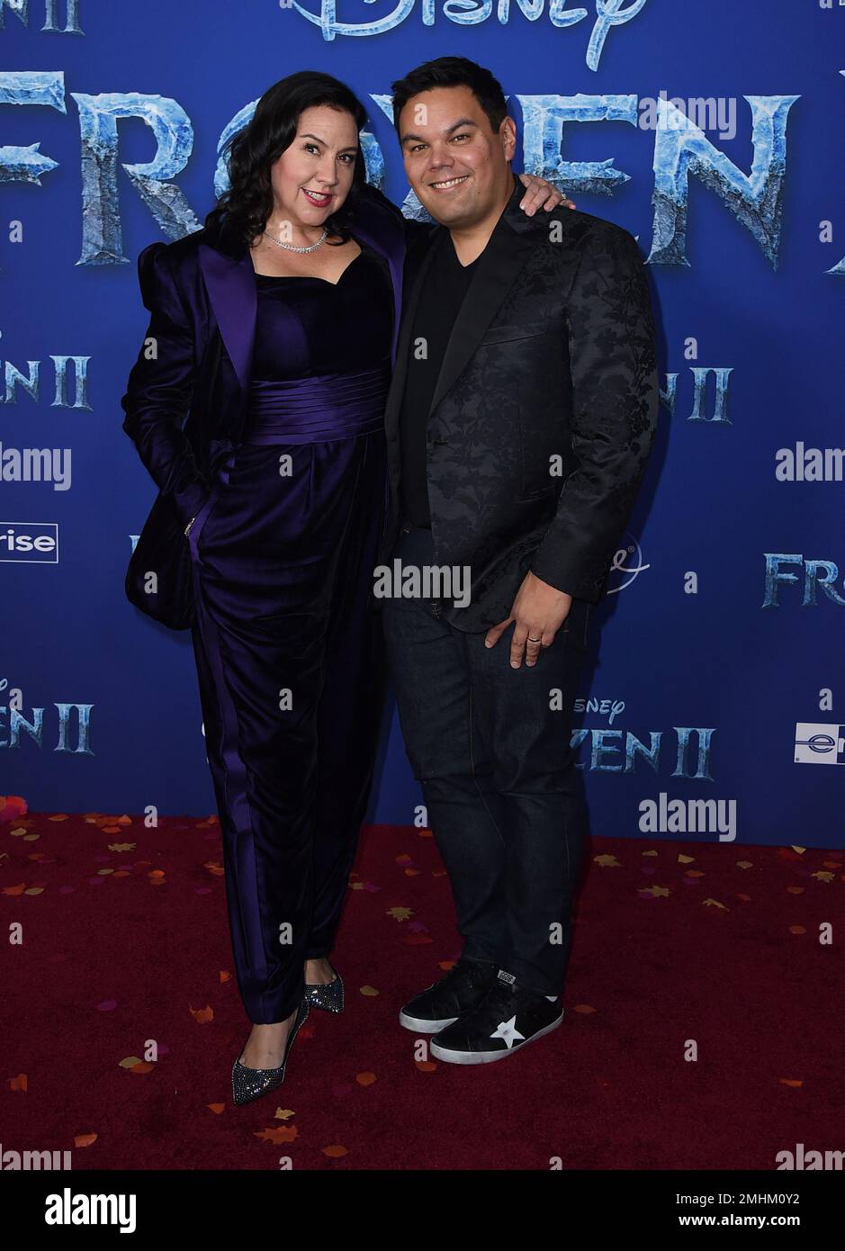 Songwriters Kristen Anderson-Lopez, left, and Robert Lopez arrive at ...