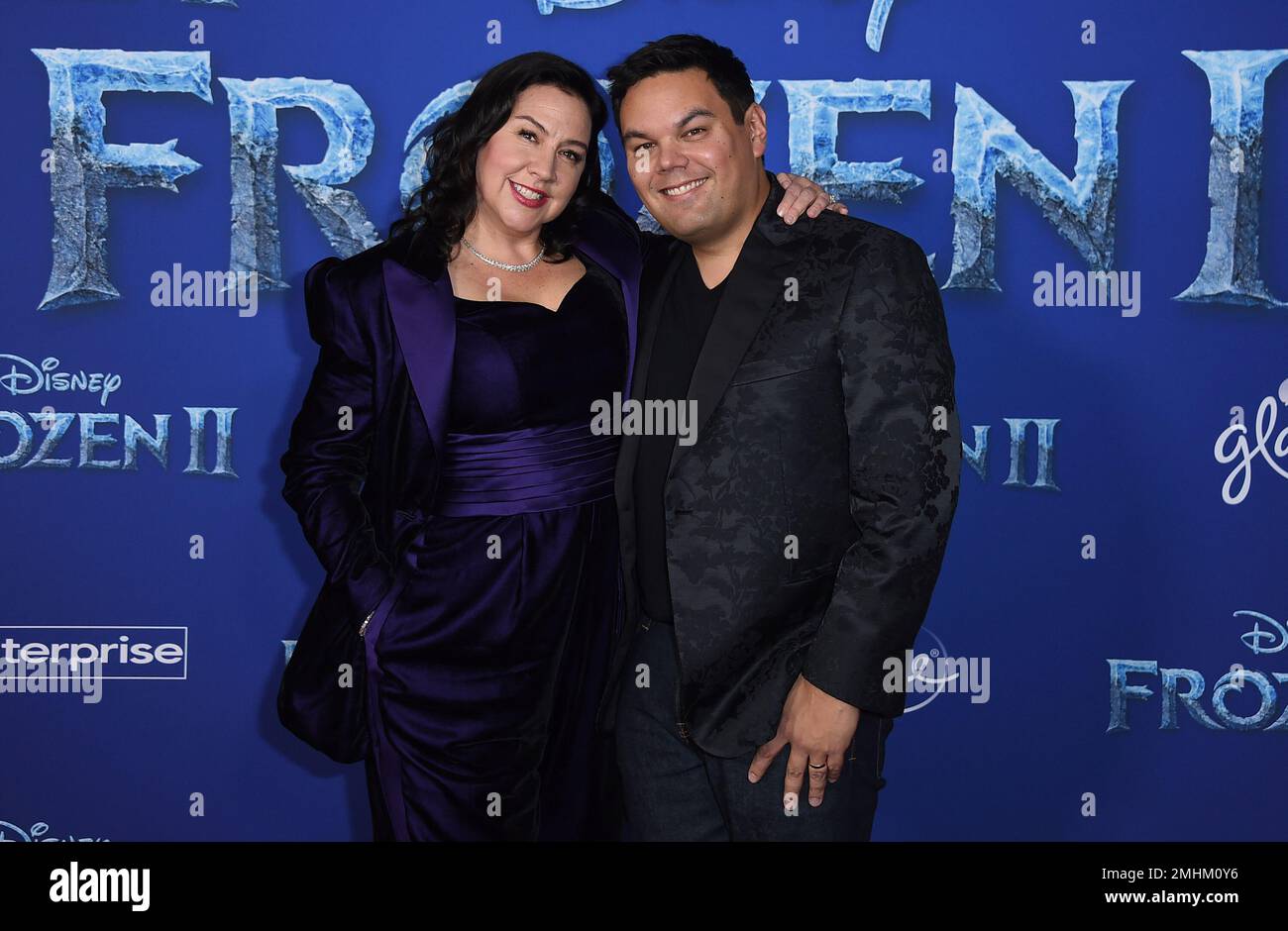 Songwriters Kristen Anderson-Lopez, left, and Robert Lopez arrive at ...