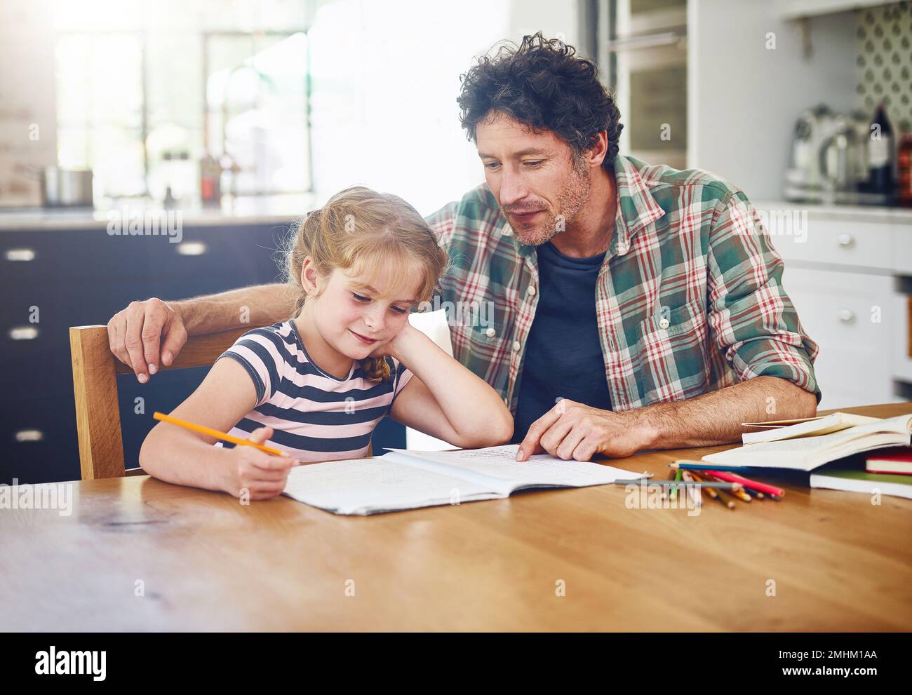 Think carefully now about your answer...a father helping his daughter ...