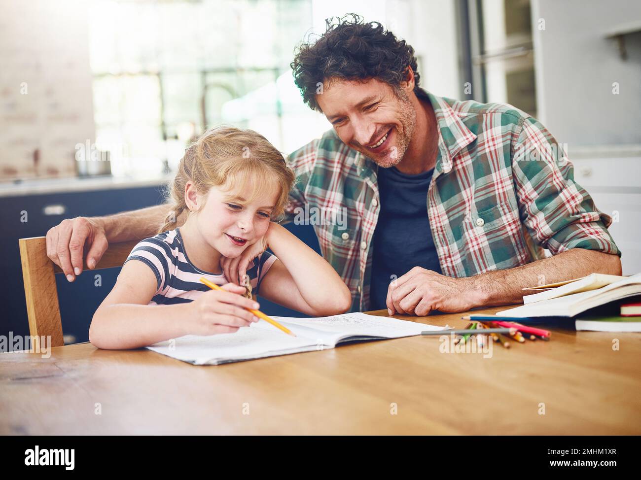 Dad always provides encouragement along the way. a father helping his ...