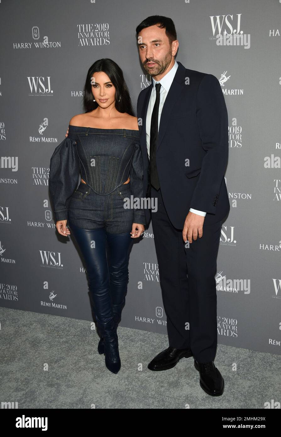 Kim Kardashian West poses with honoree Riccardo Tisci at the WSJ ...