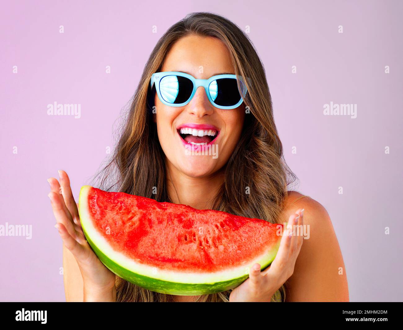 You cant have watermelon with a sad face. Studio shot of a beautiful ...