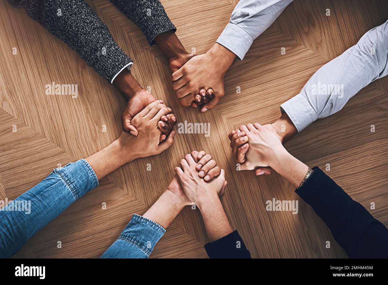 We are stronger when we stand together. High angle shot of a group of ...