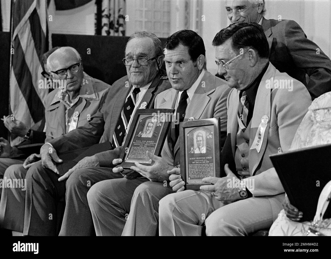 Four new inductees in the baseball Hall of Fame show off their plaques ...