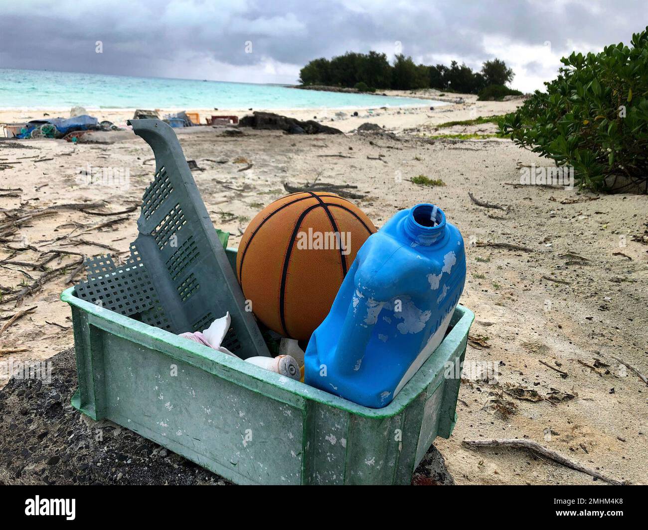 Marine debris sits on the beach on Midway Atoll in the Northwestern ...