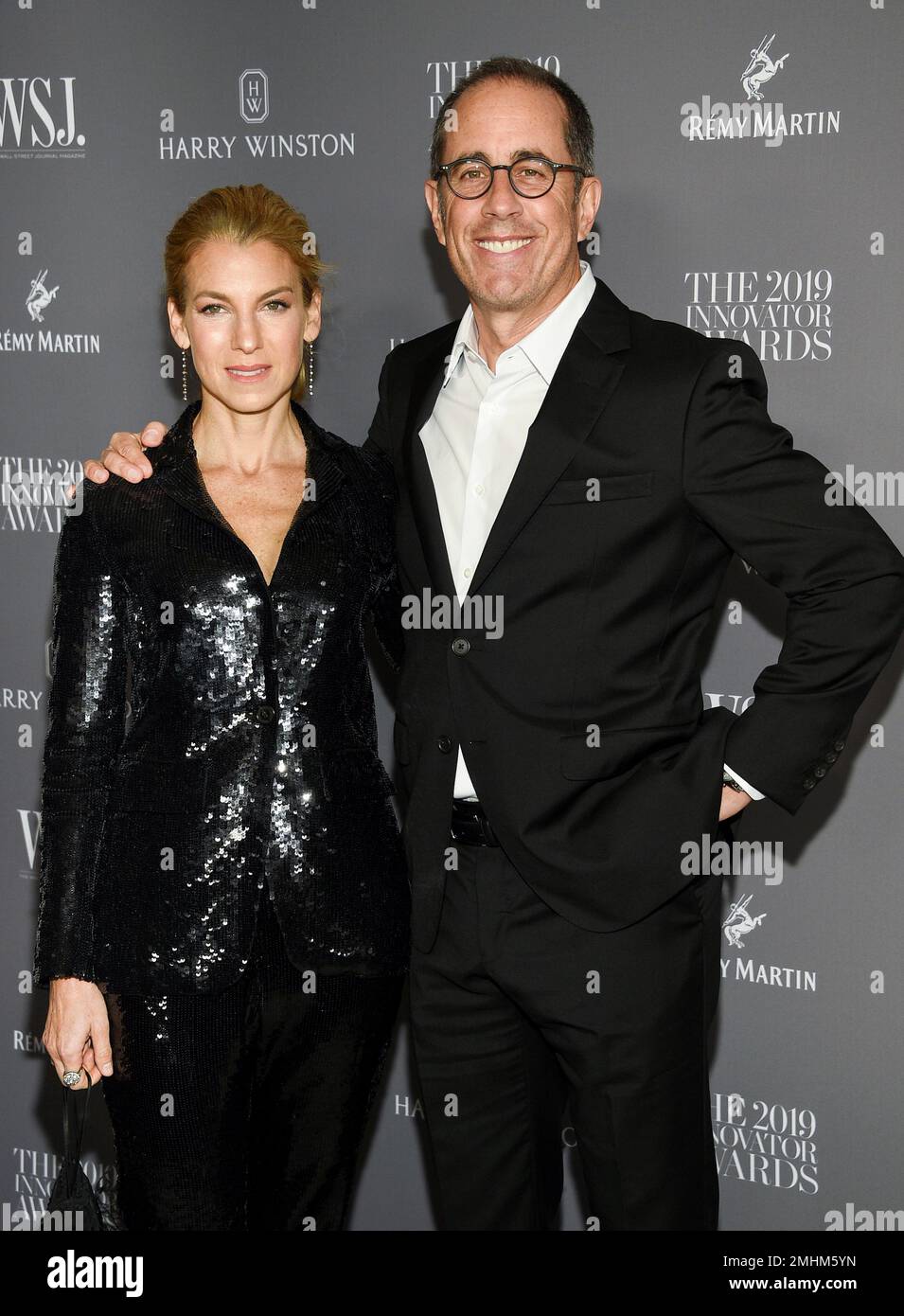 Comedian Jerry Seinfeld, right, and wife Jessica Seinfeld attend the ...