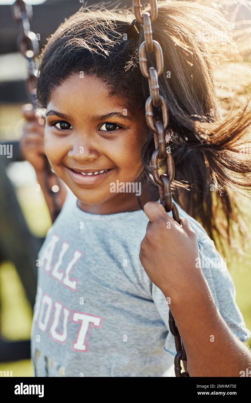 Shes the queen of the swing. Cropped portrait of an adorable little ...