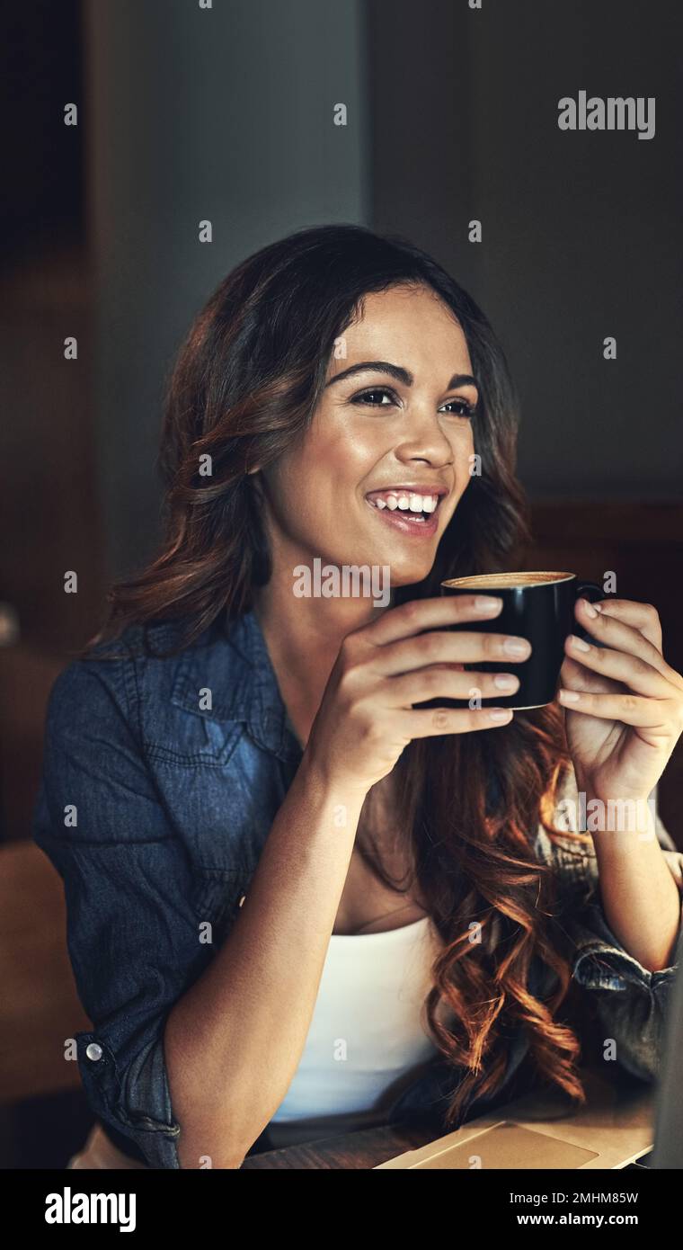 Life is too short for bad coffee. a relaxed young woman enjoying a cup ...