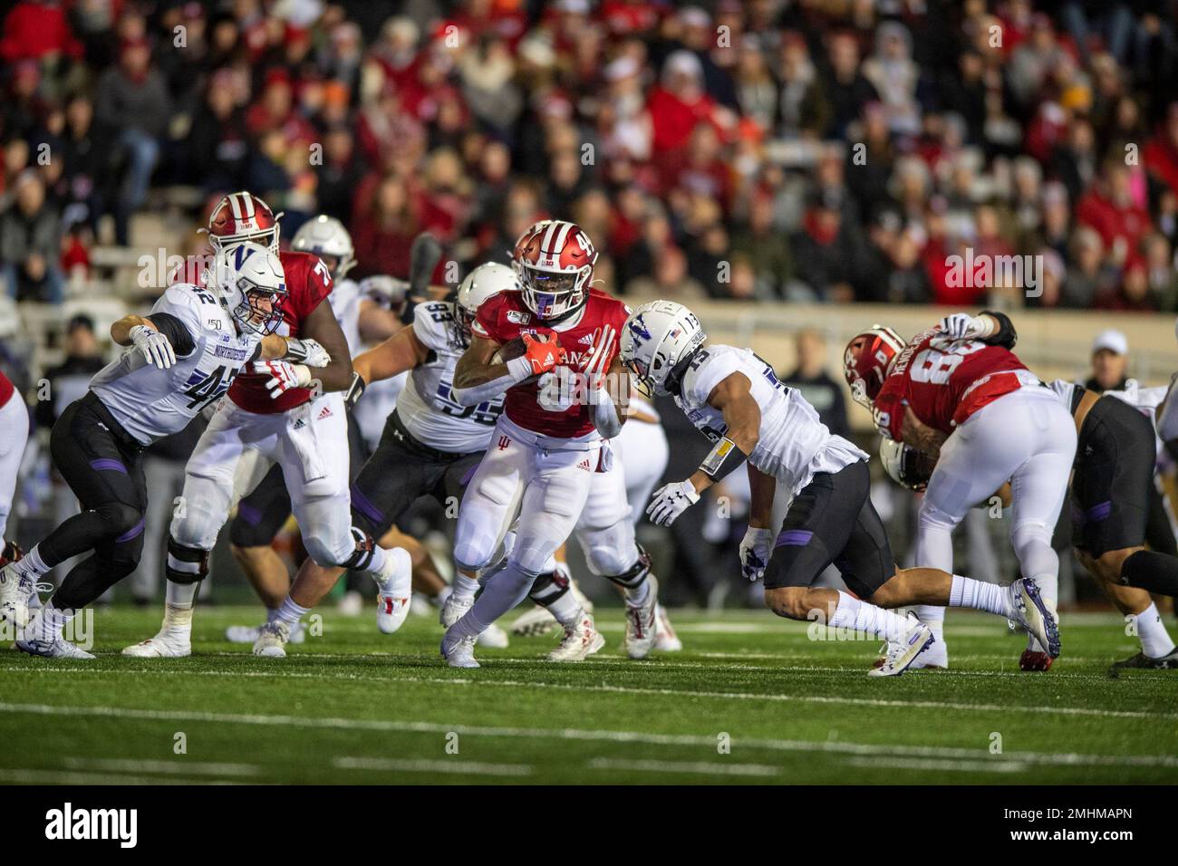 Indiana running back Stevie Scott III (8) rushes the ball out of the ...