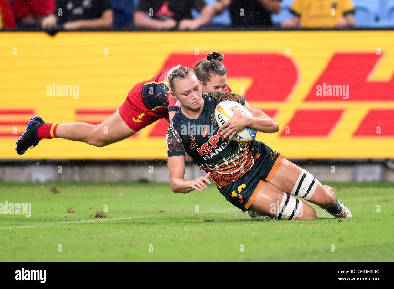 Maddison Levi of Australia scores a try during the HSBC Sydney Sevens ...
