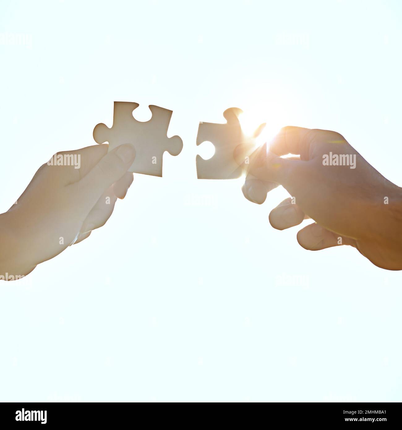 Every puzzle has a solution. A cropped shot of hands holding puzzle ...