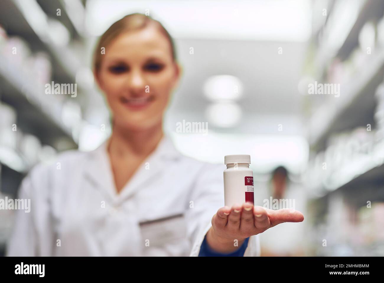 I have the perfect solution. a pharmacist recommending medication Stock ...