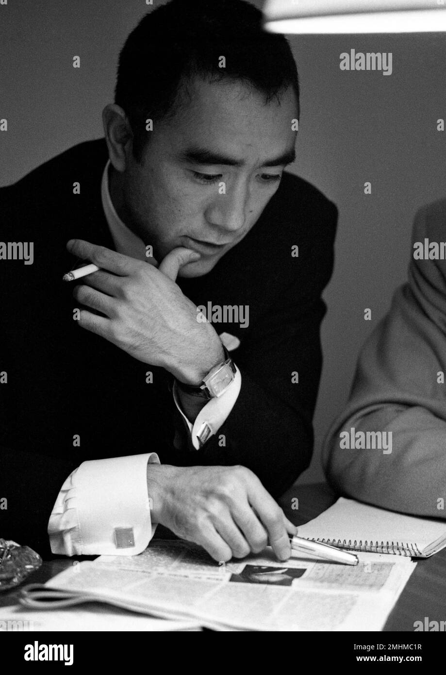 The Japanese writer Yukio Mishima, smoking, in Paris on Oct. 6, 1965 ...