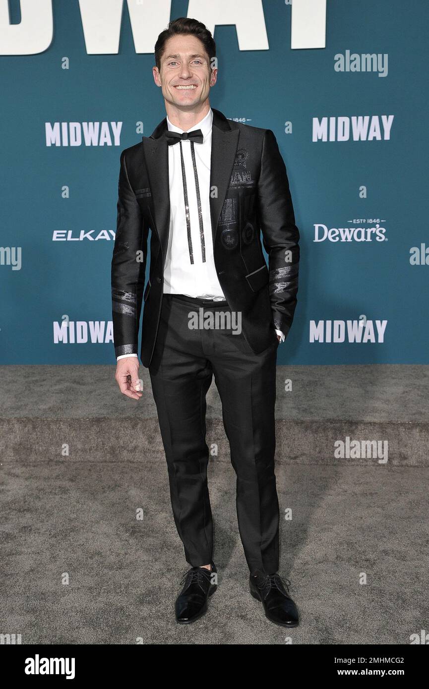 Matthew MacCaull attends the world premiere of "Midway" at the Regency ...