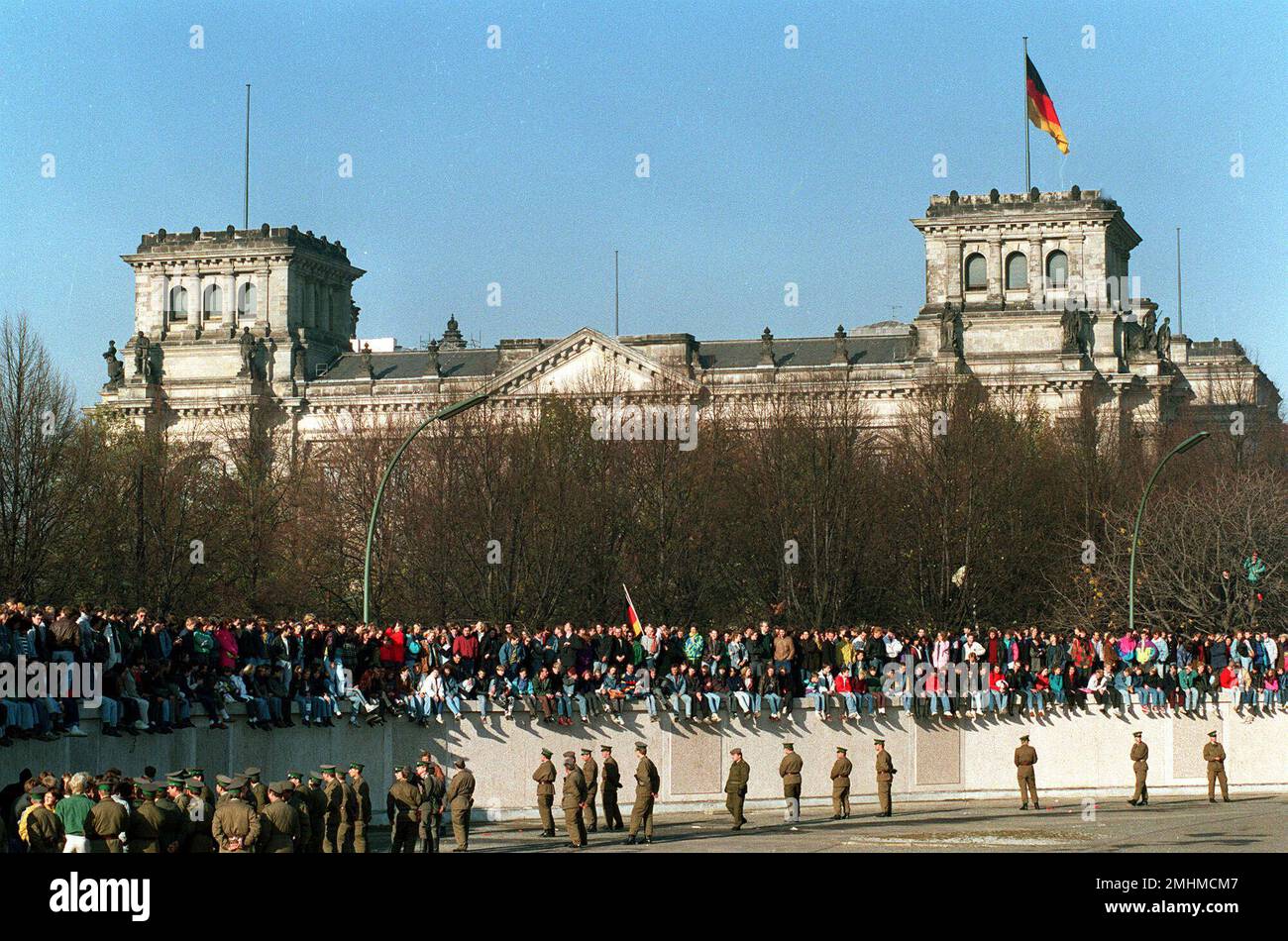 FILE - In this Friday, Nov. 10, 1989 file photo, Germans from East and ...