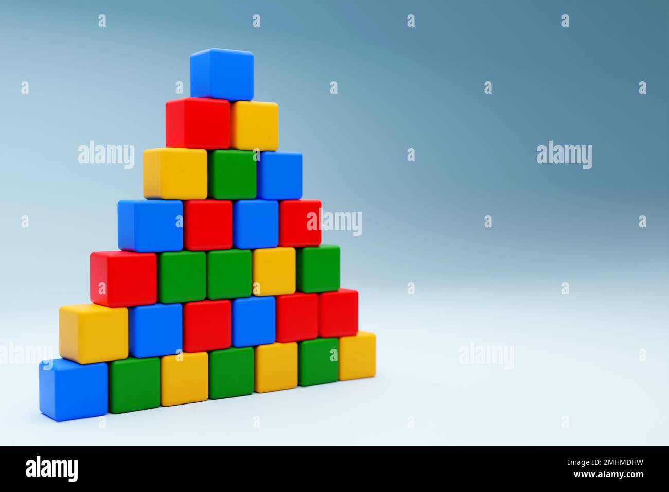 Close-up bright colorful toy made of plastic blocks. children's ...