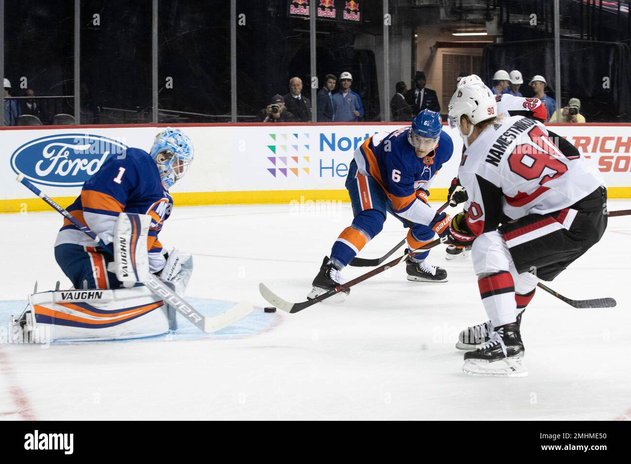 New York Islanders goaltender Thomas Greiss (1) makes the save against ...