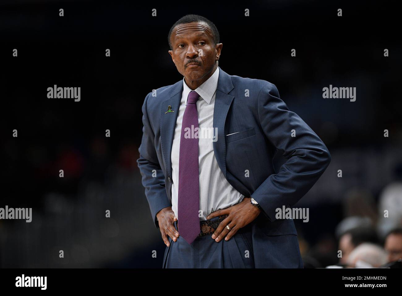 Detroit Pistons head coach Dwane Casey stands on the court during the ...