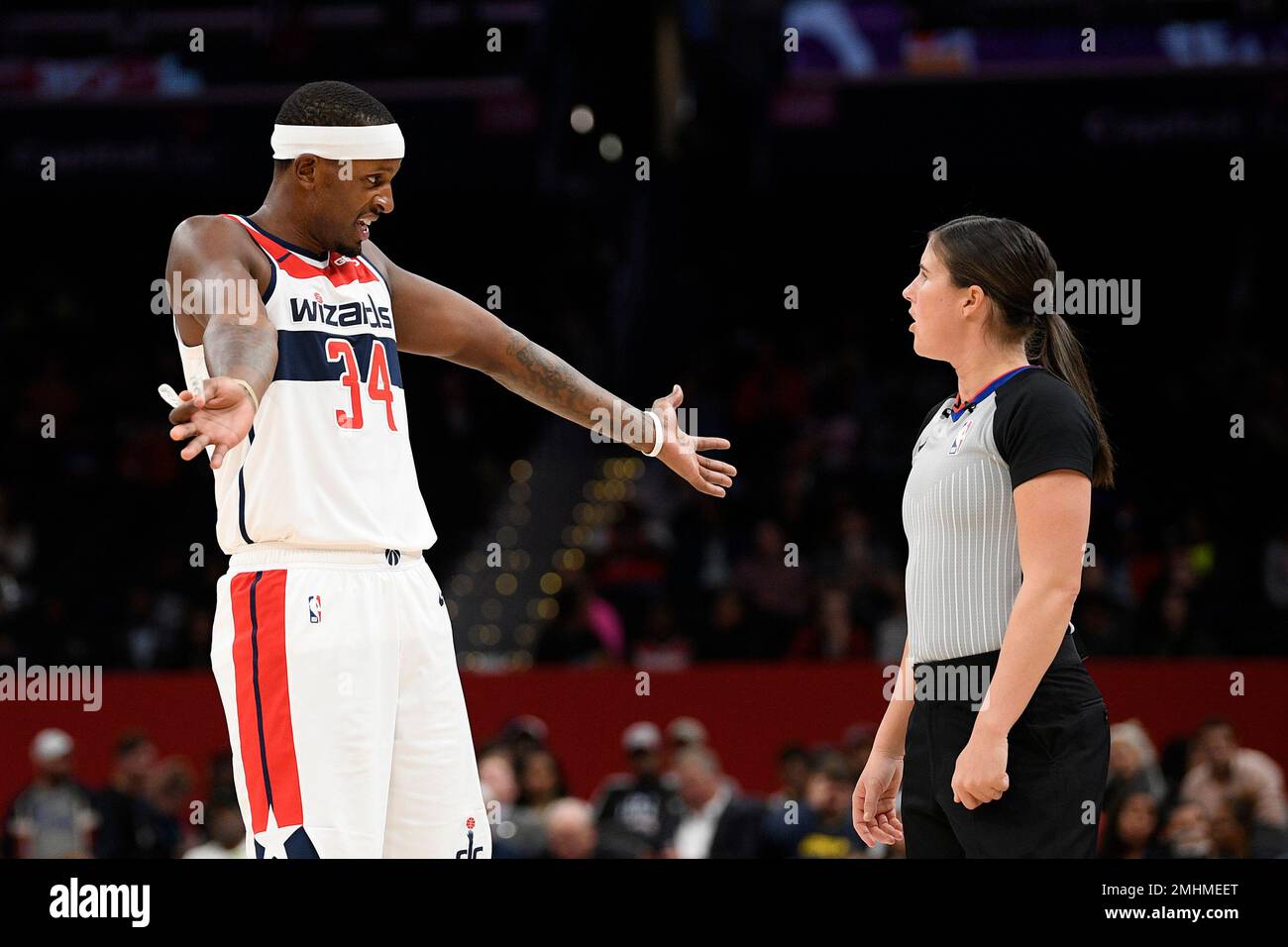 Washington Wizards guard C.J. Miles (34) gestures next to referee ...