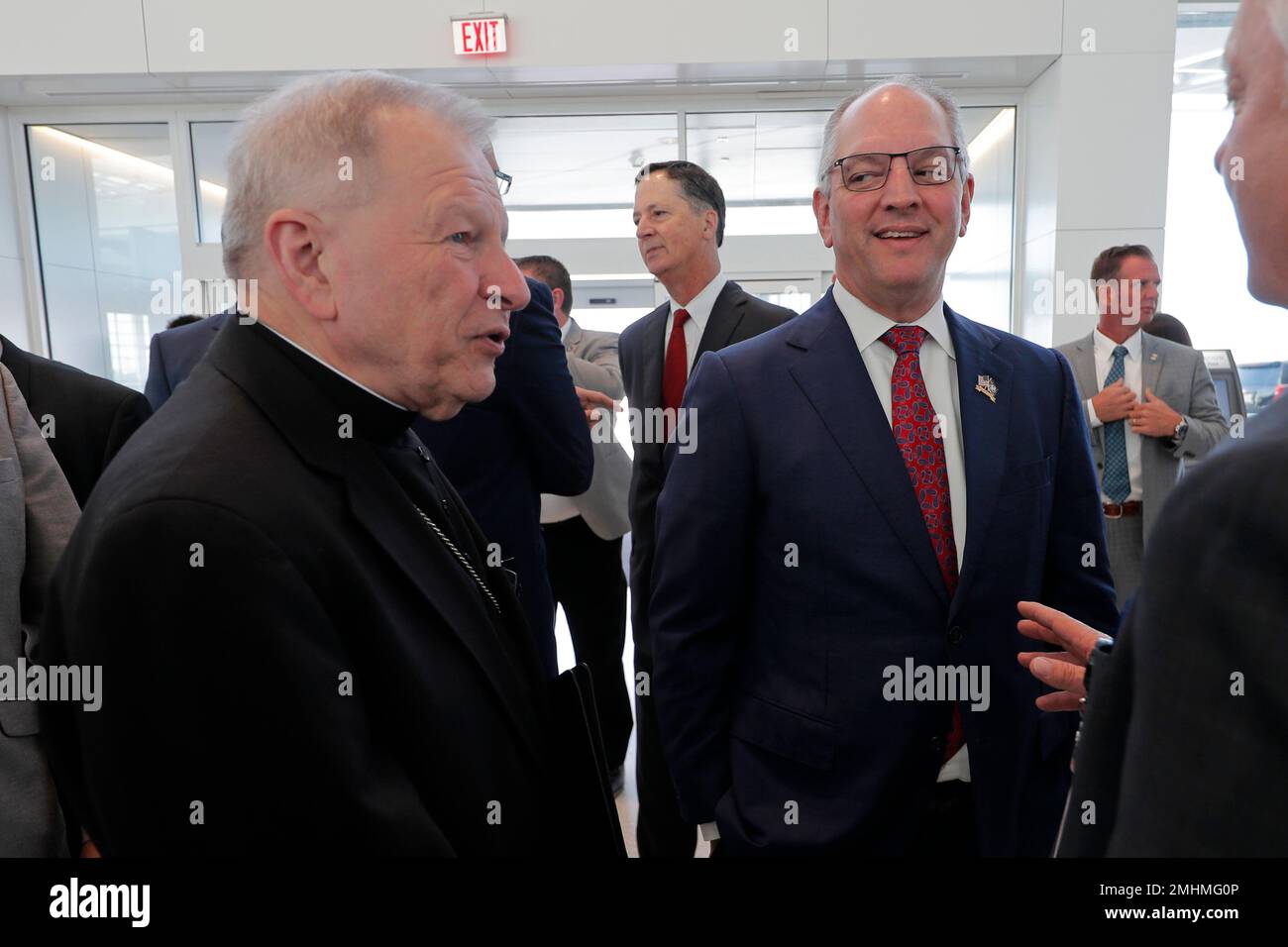 Louisiana Gov. John Bel Edwards talks with New Orleans Archbishop ...