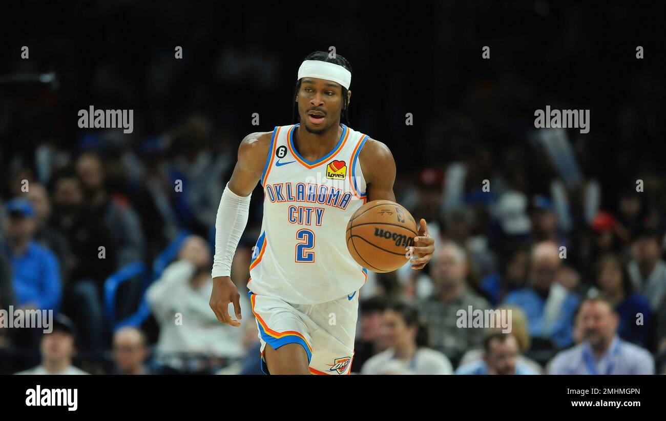 Oklahoma City Thunder guard Shai Gilgeous-Alexander pushes down the ...