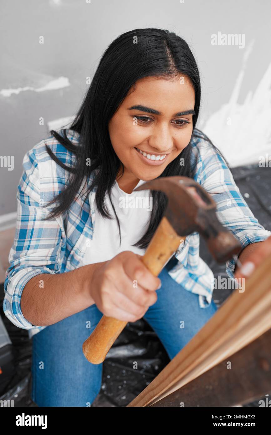 Woman repairing house diy hi-res stock photography and images - Alamy