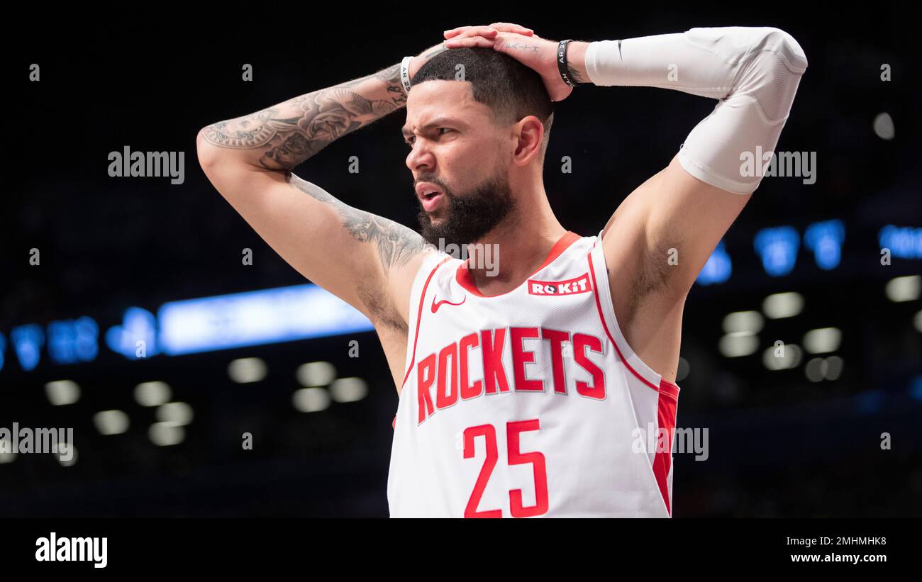 Houston Rockets guard Austin Rivers reacts during the first half of an ...