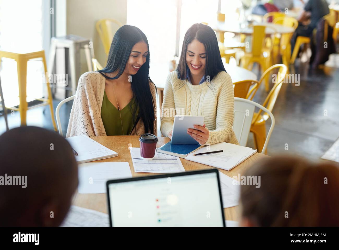 But first, memes. a group of young friends having a study session in a ...