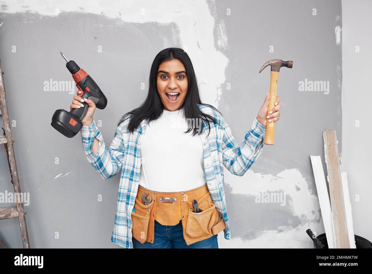 Woman tool belt hi-res stock photography and images - Alamy