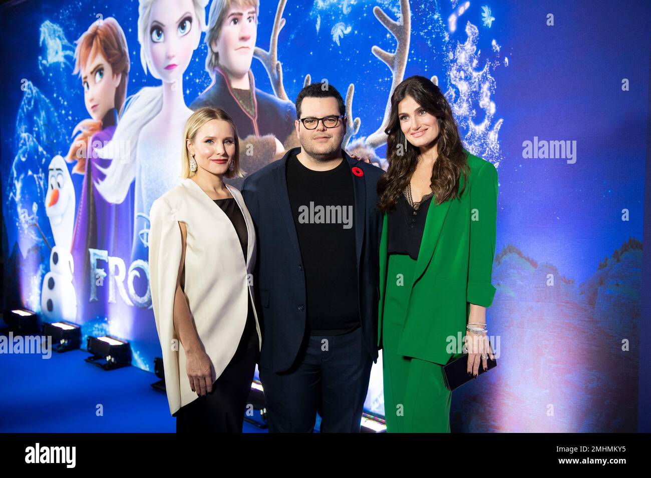From left, actors Kristen Bell, Josh Gad and Idina Menzel pose during ...