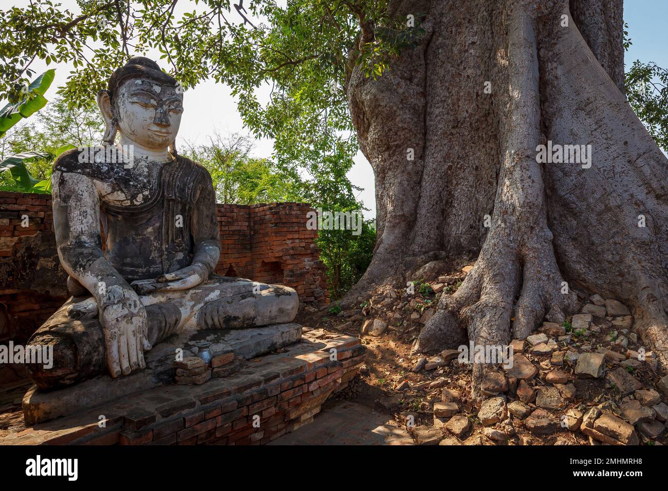 Buddha Statue at the temple ruins of Ava in Myanmar Stock Photo - Alamy