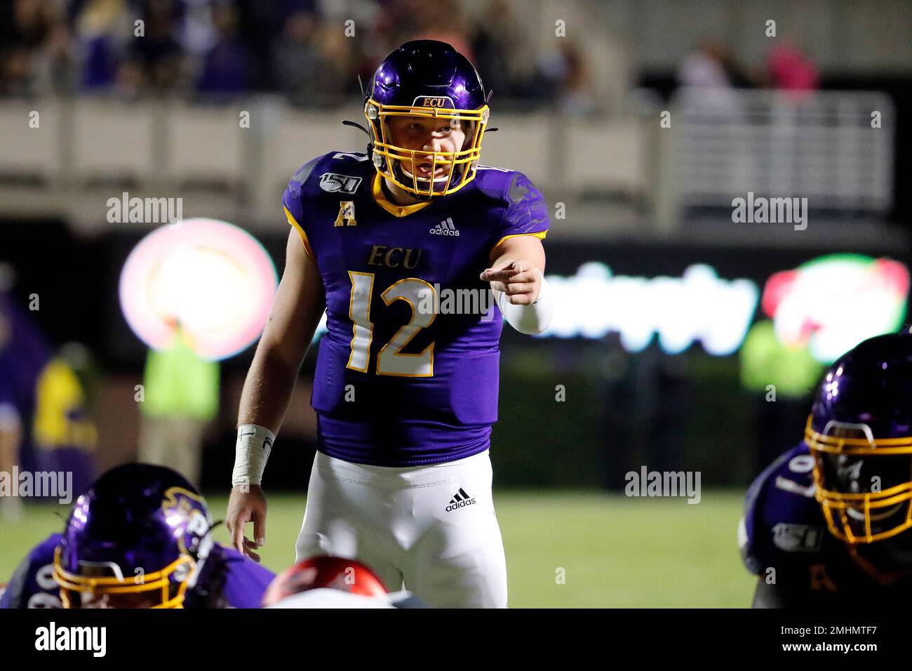 East Carolina's Holton Ahlers (12) changes the play against Cincinnati ...