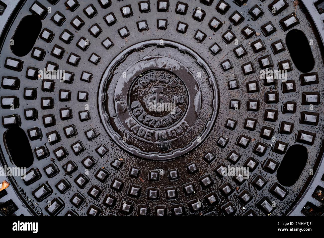 This Saturday, Nov. 2, 2019 photo, shows a manhole cover surviving from ...