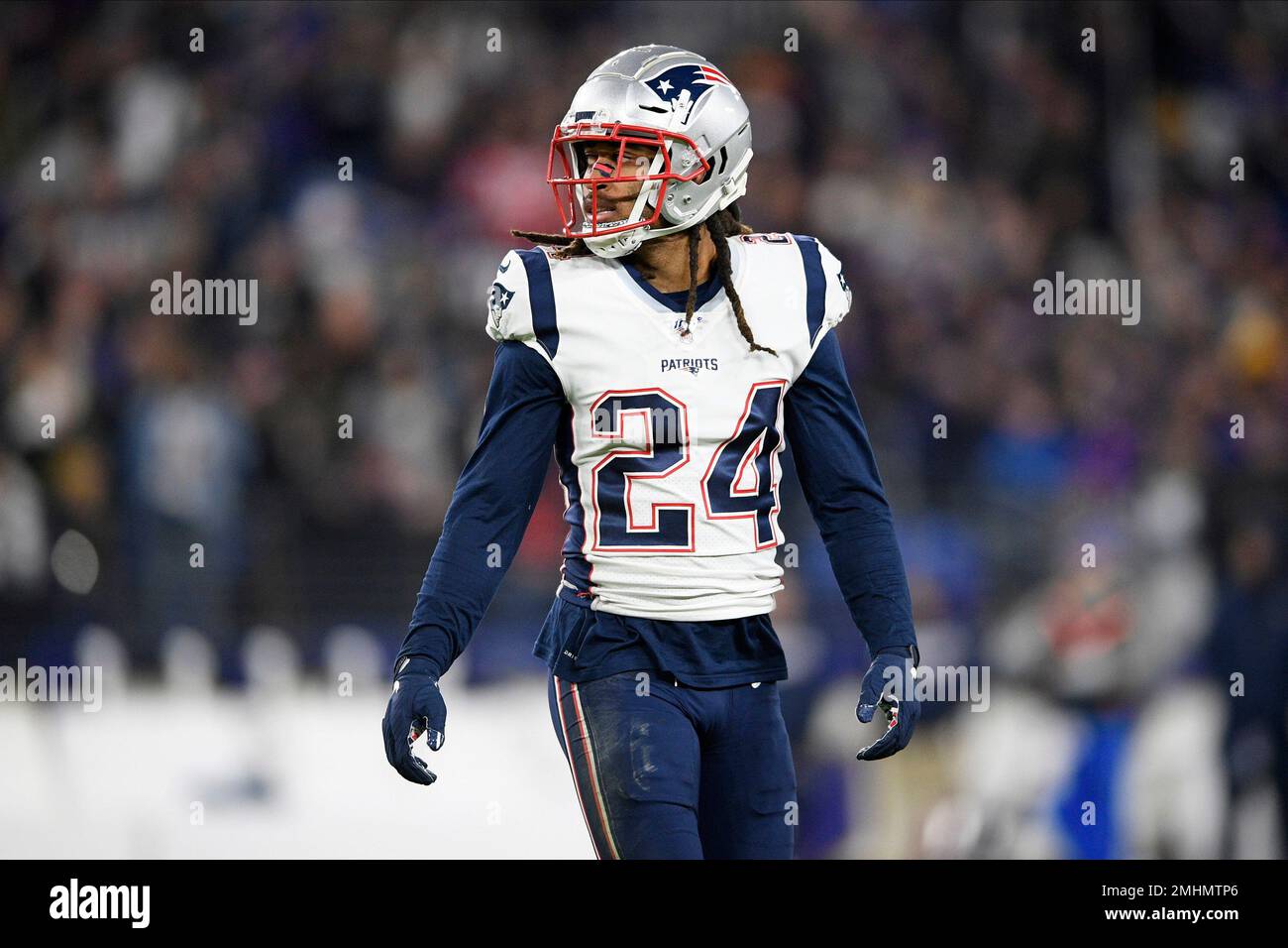 New England Patriots cornerback Stephon Gilmore looks on during the ...