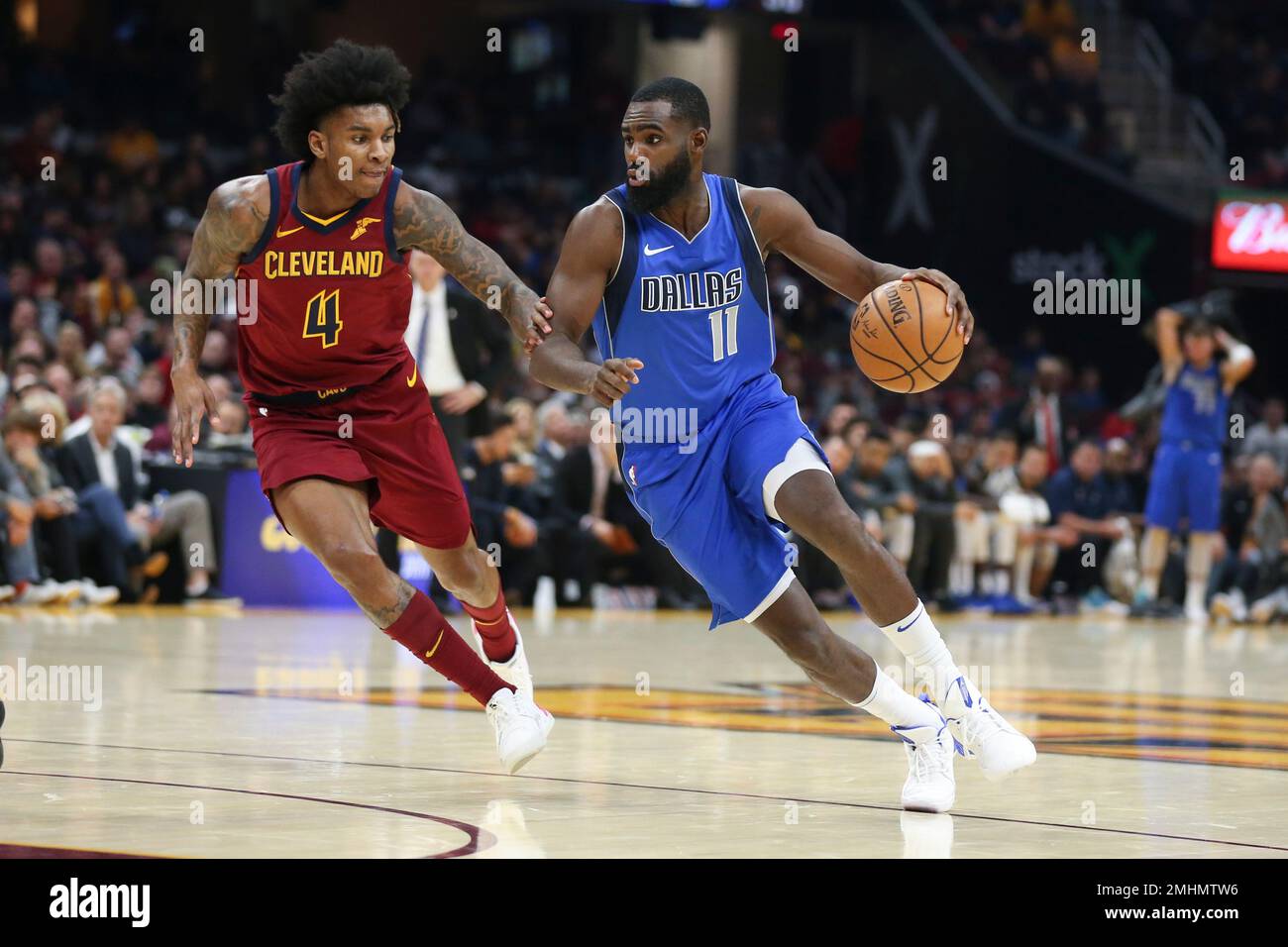 Dallas Mavericks' Tim Hardaway Jr. drives on Cleveland Cavaliers' Kevin ...