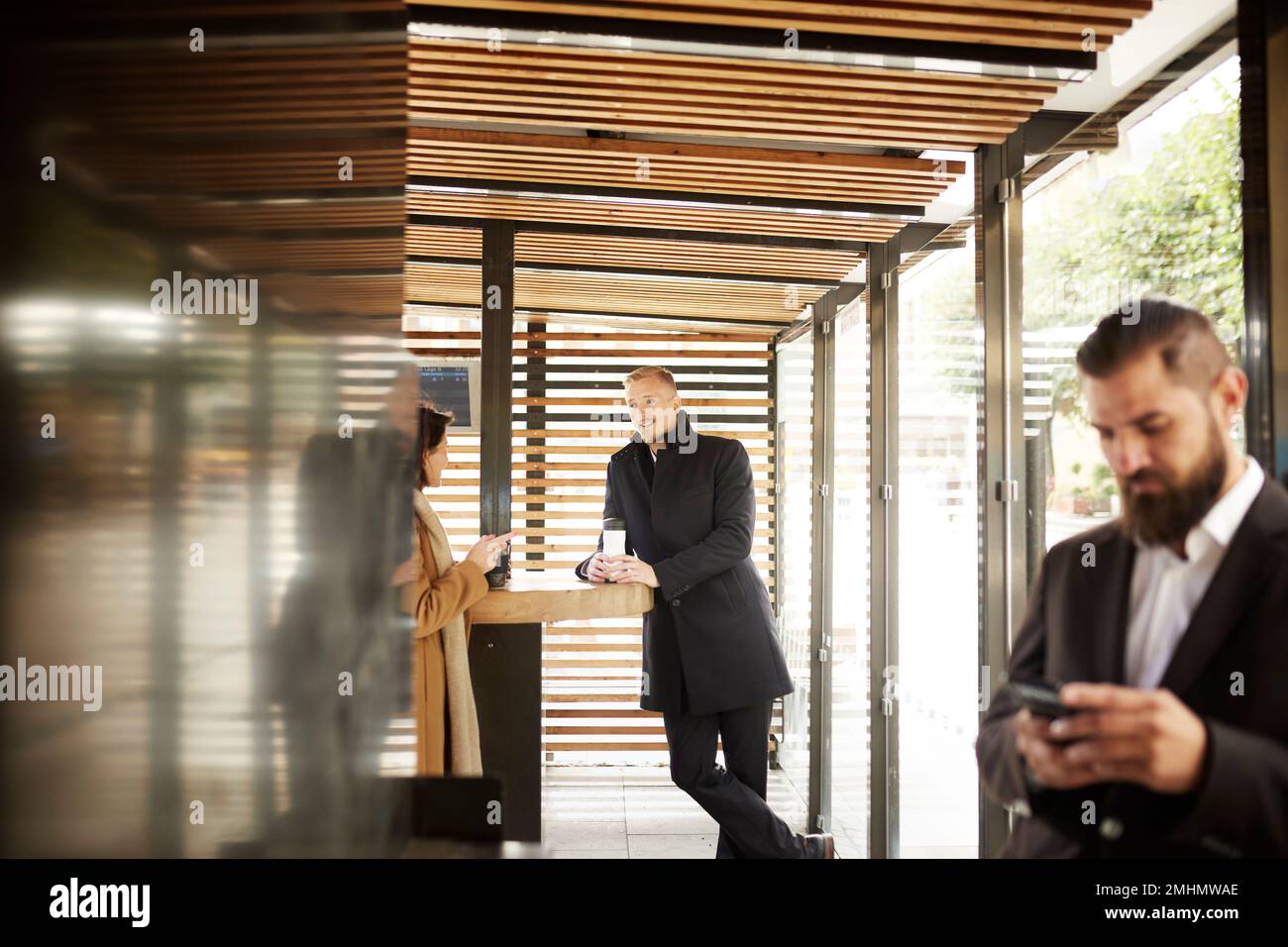 Business people talking together Stock Photo - Alamy