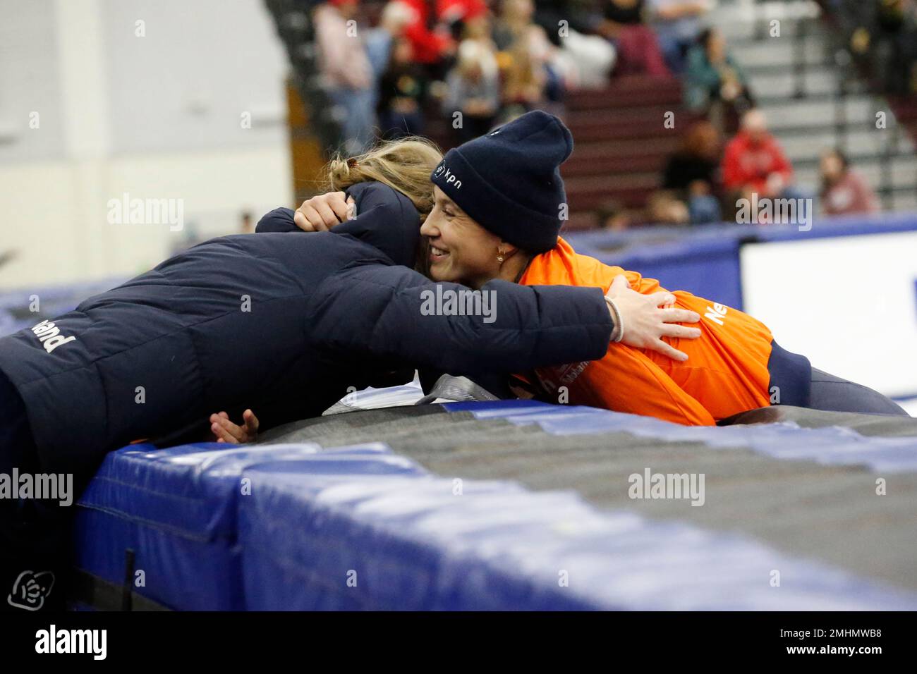 Netherland's Suzanne Schulting, right, receives a hug following the ...