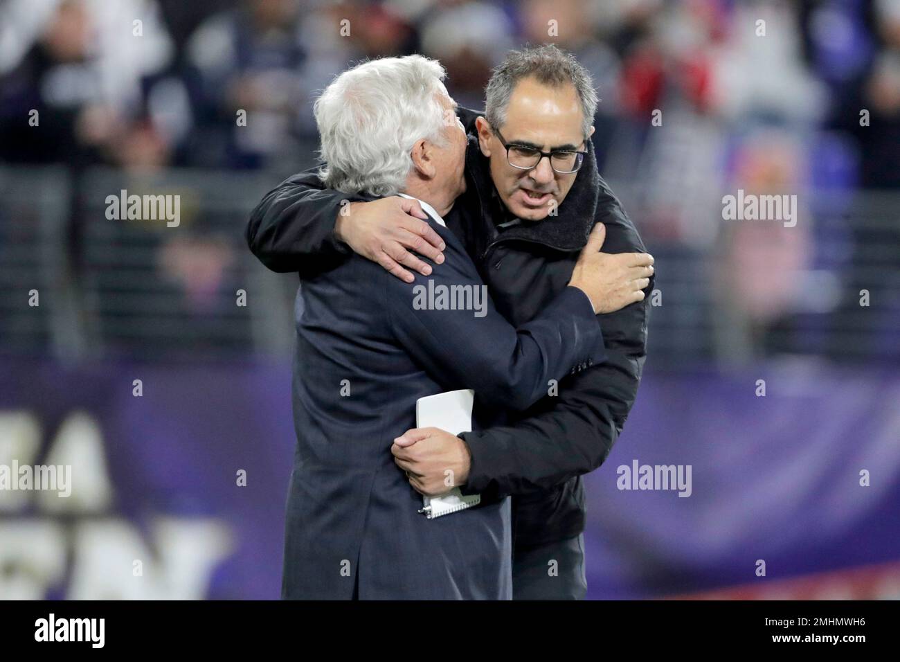 New England Patriots owner Robert Kraft, left, hugs NFL Network's ...