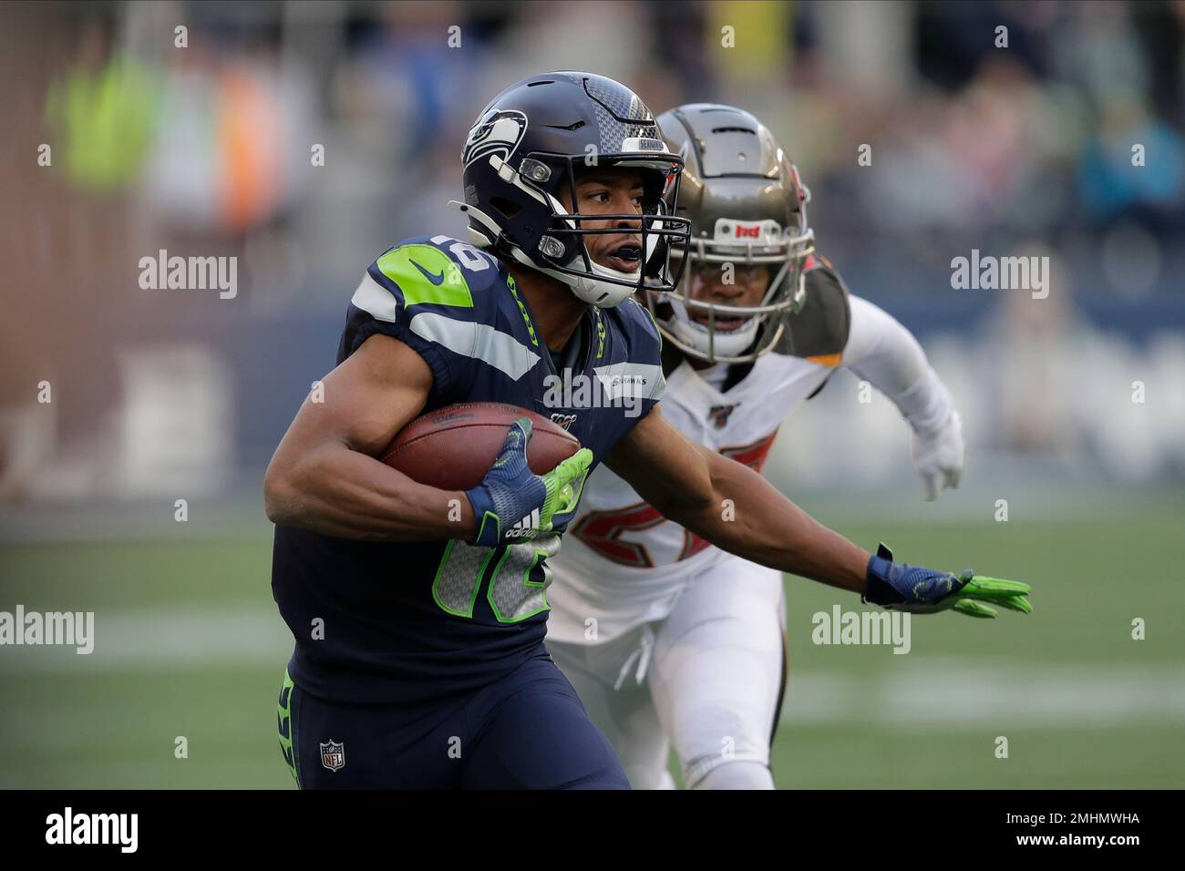 Seattle Seahawks wide receiver Tyler Lockett runs after making a catch ...