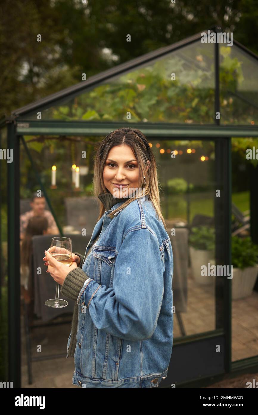 One woman outside home jacket hi-res stock photography and images - Alamy
