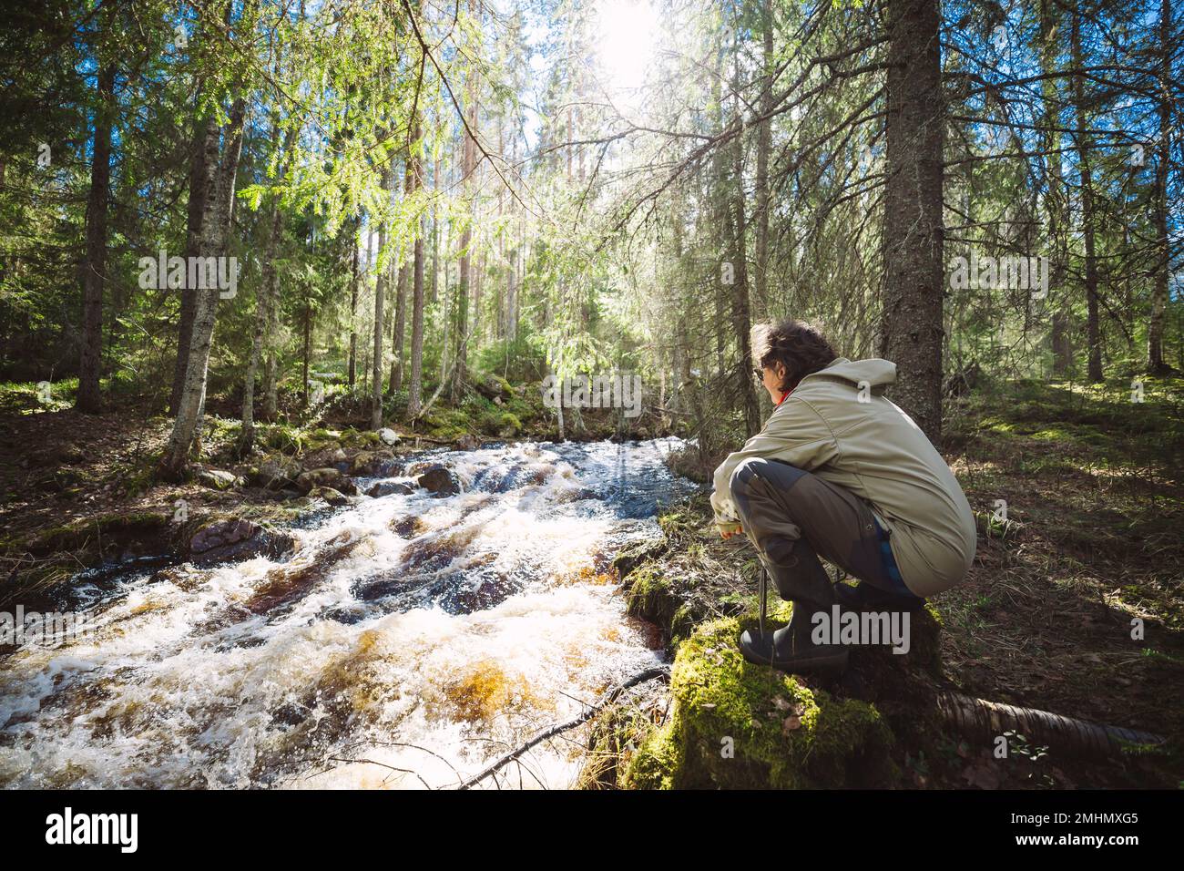 Crouching lady hi-res stock photography and images - Alamy