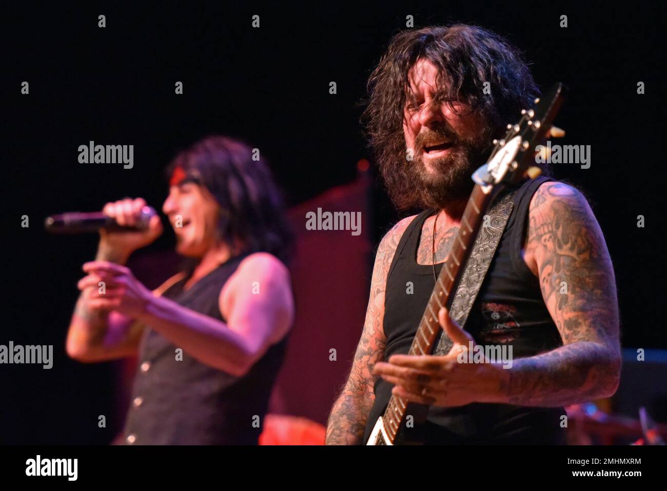 Phil Lewis, left, and Tracii Guns of L.A. Guns perform at the Arcada ...