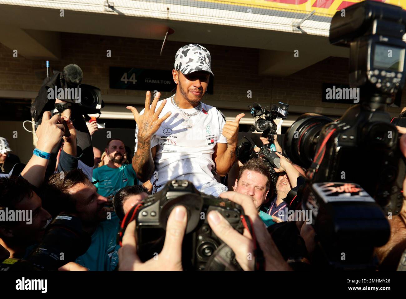Mercedes driver Lewis Hamilton, of Britain, celebrates following the ...