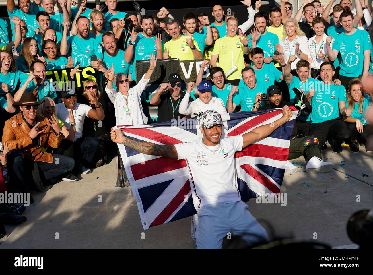 Mercedes driver Lewis Hamilton, of Britain, celebrates following the ...